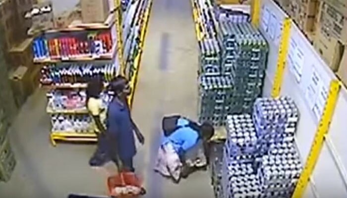 Watch Video : Woman steals a 24 case of beer under her dress | देखें ...