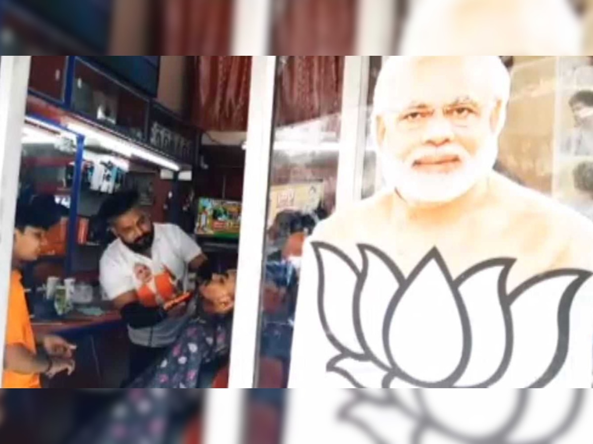 Hair dresser giving free hair cutting and shaving on the occasion of ...