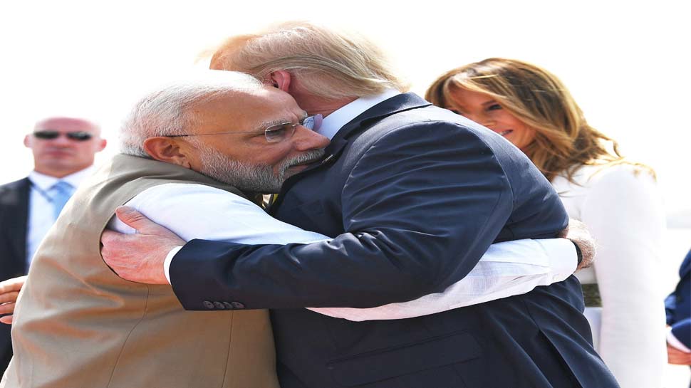 pm narendra modi hugs american president donald trump at ahmedabad ...