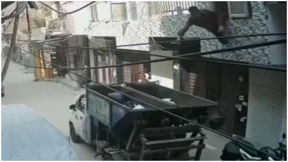 viral video of man throwing garbage from window and falling in the ...