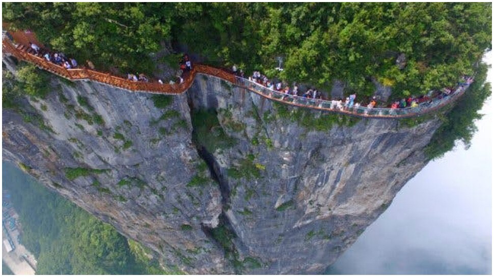 coiling dragon cliff skywalk in china is the most dangerous bridge in ...