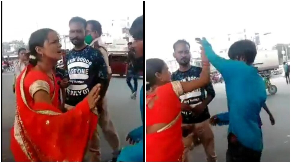 viral video of lucknow woman beating man with chappal on road | Viral ...