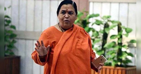 uma bharti lost posters in indore congress workers after new liquor ...