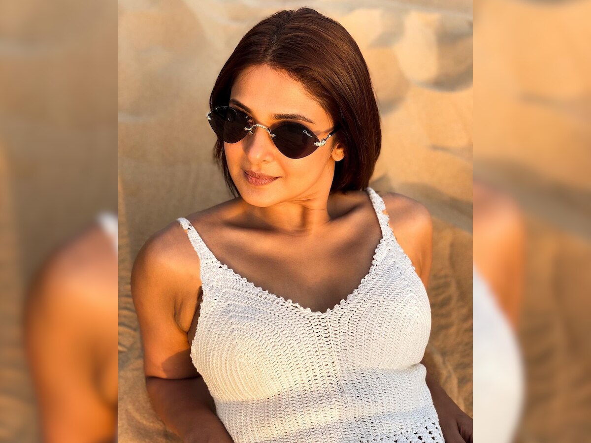 Jennifer Winget tease fans in yellow bra lying on sand Jennifer Winget ...