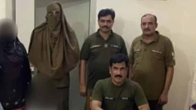 Pakistani Punjab Police makes the male official wear a niqab for a ...