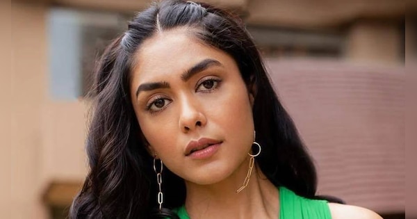 Mrunal Thakur look bold in silver strapless bodycon dress see pics ...