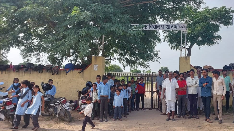 Angered by the lateness of the school staff in Jayal the villagers ...
