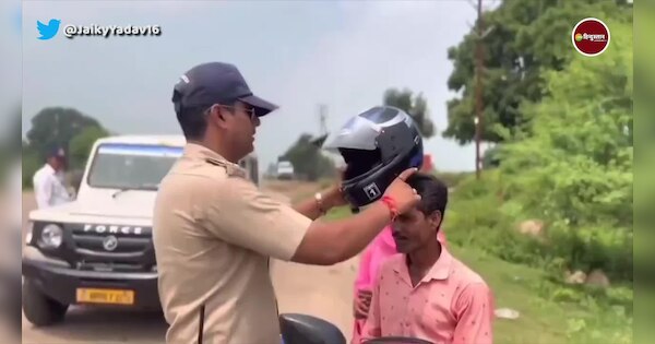 man seen driving without helmet traffic police instead of taking ...