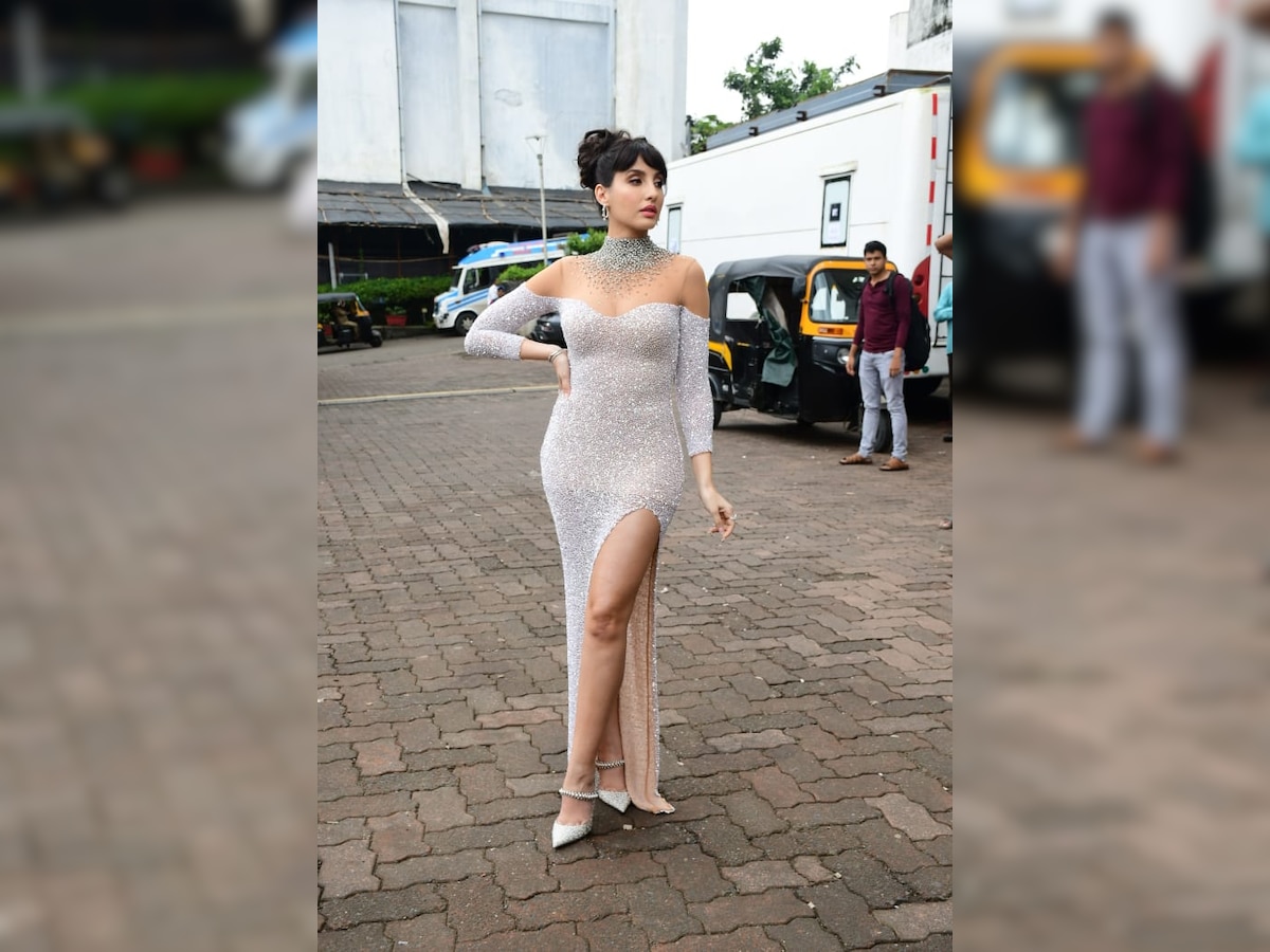 super Hot Nora Fatehi wear braless white sequence body fitted dress look hot without underwear ...