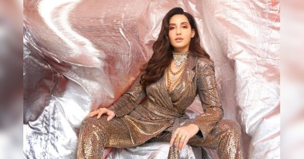 Nora Fatehi showed her super bold look in very deep neck gown see pic ...