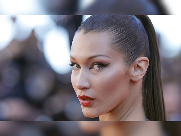 bella hadid walked on ramp without clothes artist made her spray ...