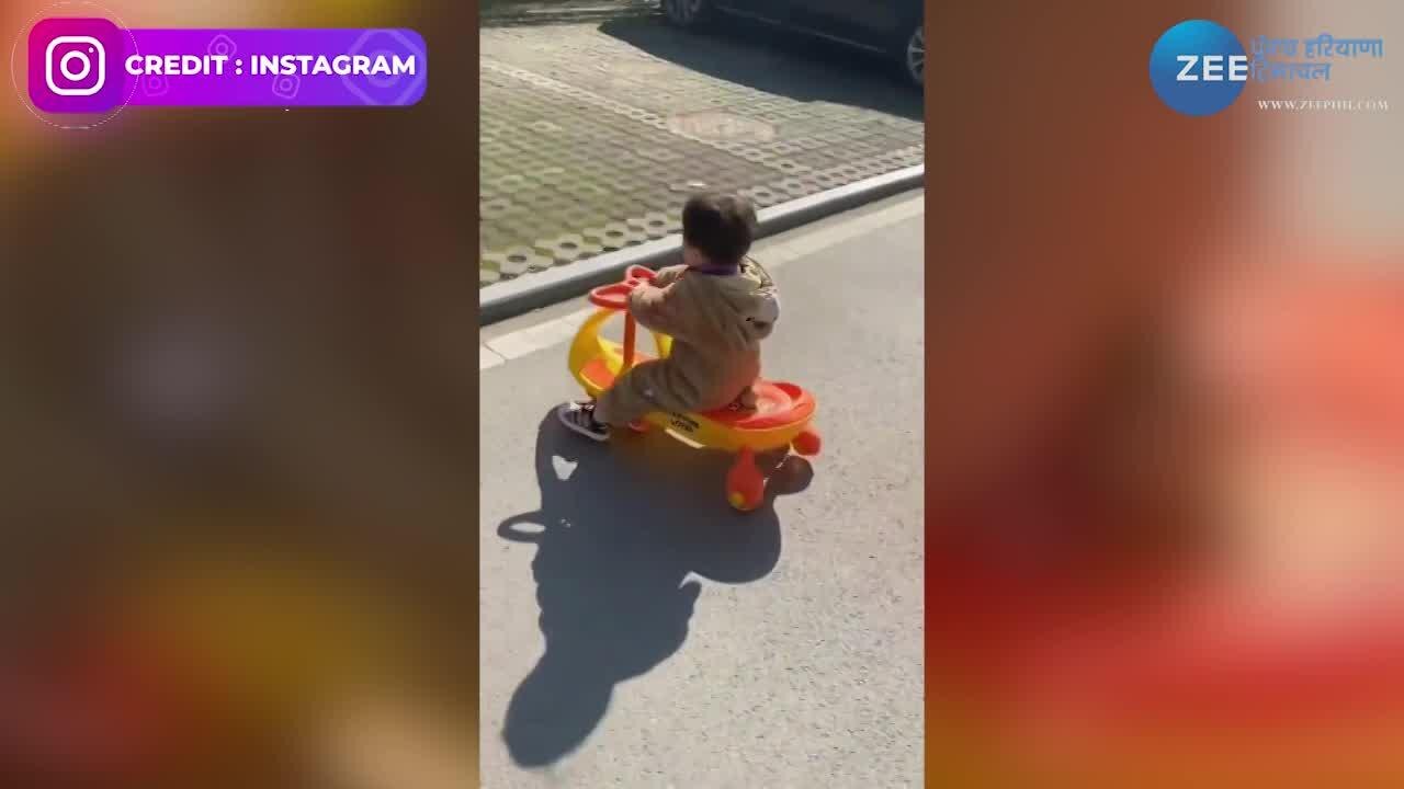 watch viral video of baby child boy does car painting with red lipstick ...