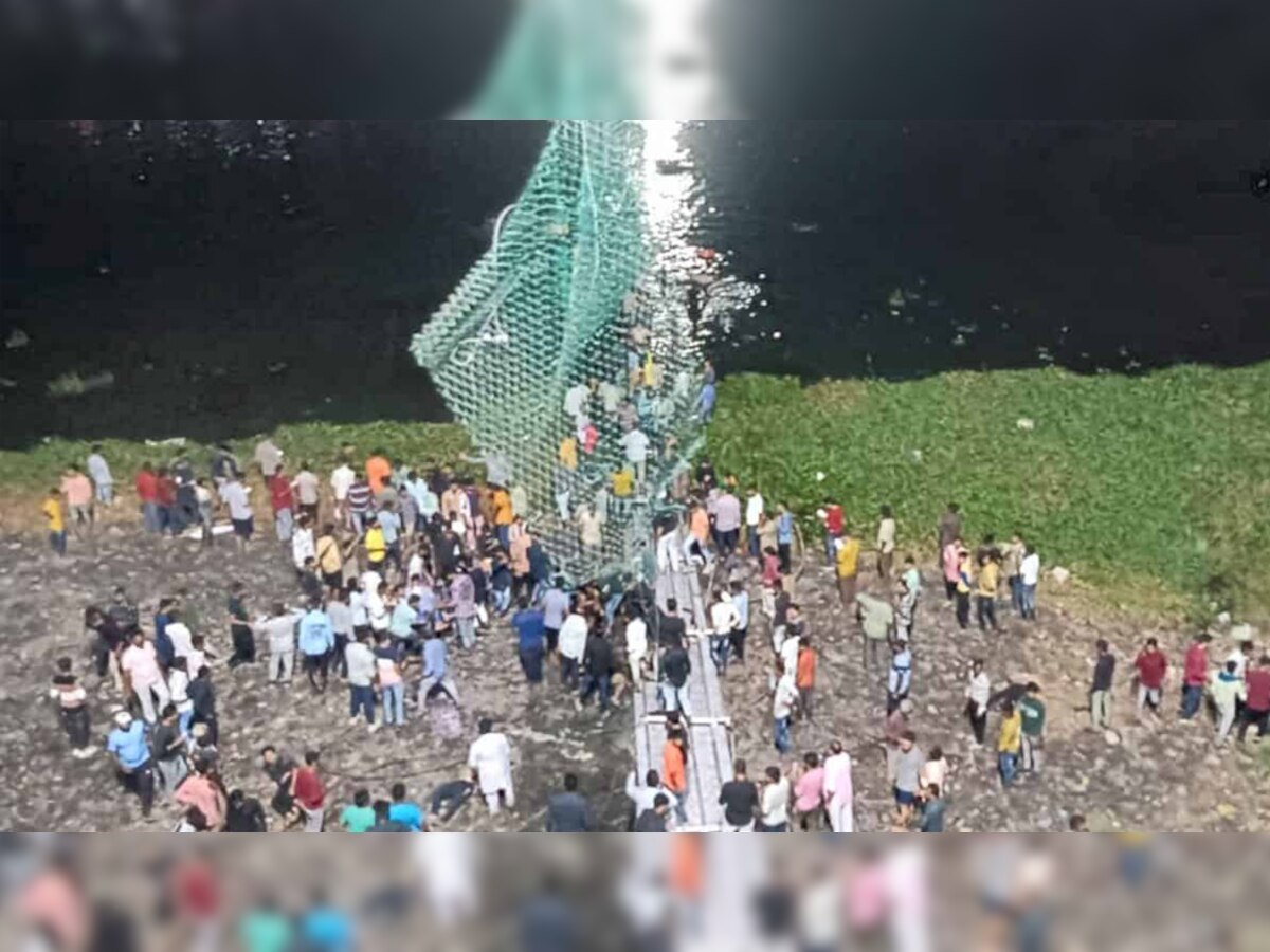 morabi bridge collaps photos pm modi announces for compensation smzs