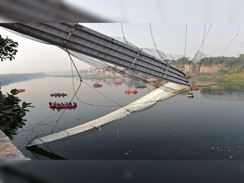 morabi bridge collaps photos pm modi announces for compensation smzs