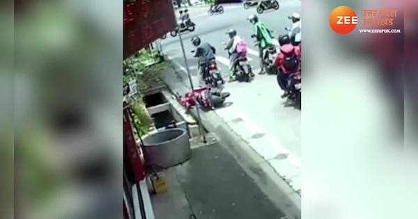 Scooty rider girl fell into drain Nala Watch VIDEO on Traffic Light ...