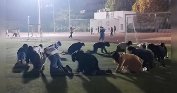 China school college students start crawling on the ground shocking ...