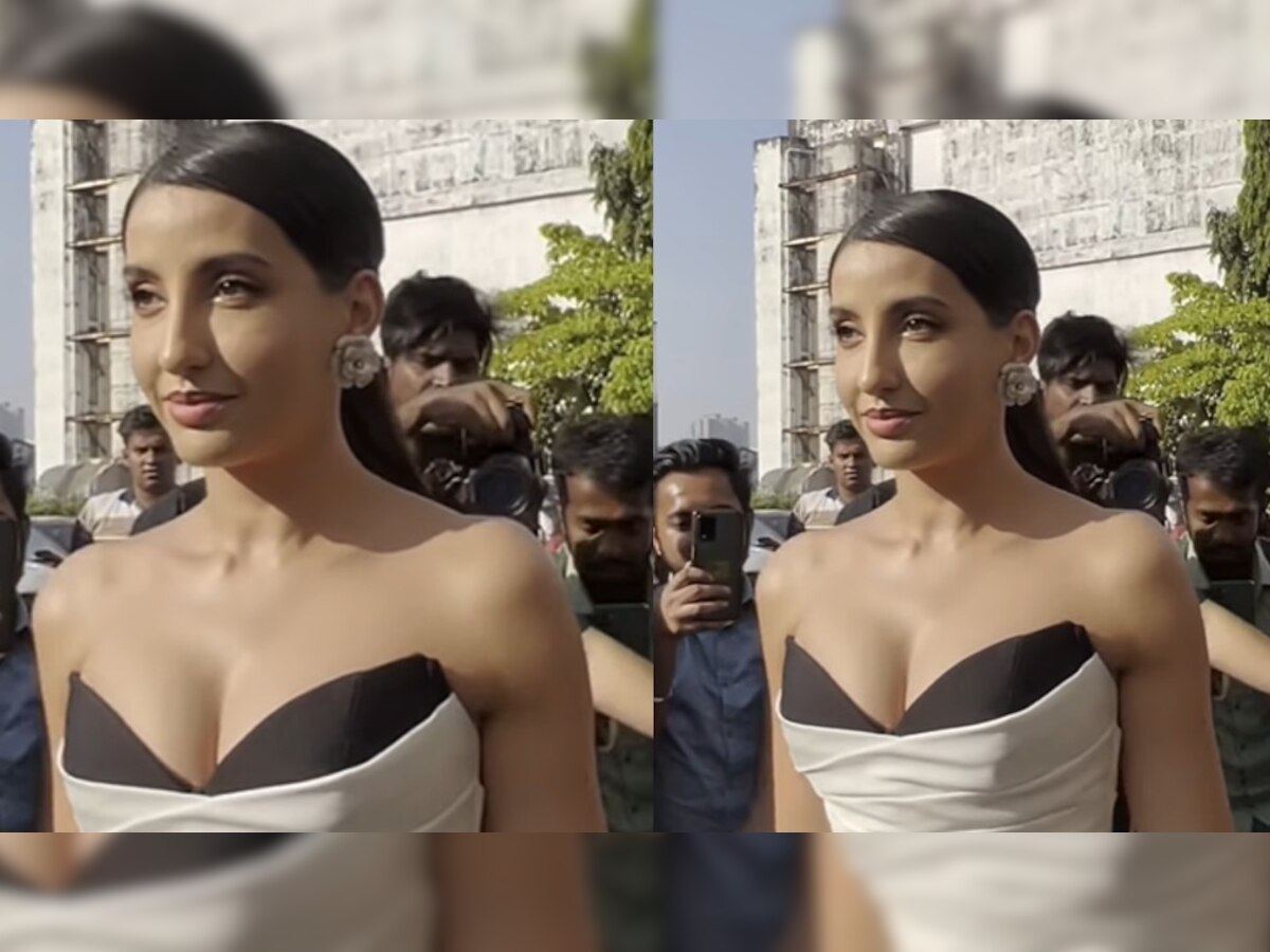 hotness queen Nora Fatehi wear off shoulder deep neck black and white gown looking hot mkph ...