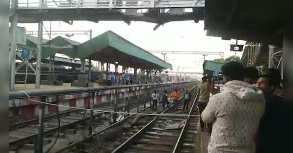 Slabs fall off of a foot over bridge at Balharshah railway junction in ...