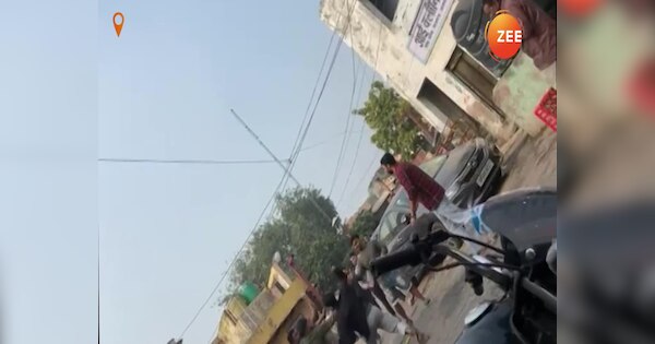 Goons fighting in front of police station threw bottles and bricks ...