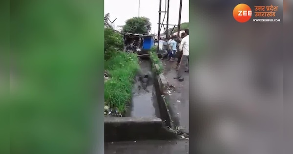 Sharabi ka video shows man dives in the drain Nala like a swimming pool ...