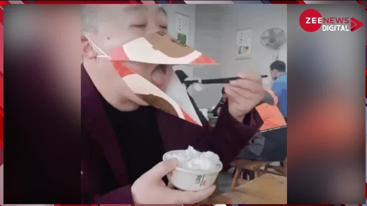 man uses funny mask while eating at Restaurant watch viral video ...