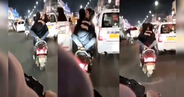Video of couple romancing on a moving scooty in Lucknow went viral people said besharam | Viral ...