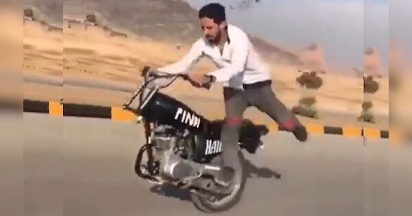 One wheel bike amazing stunt by man but fell down on road badly video ...
