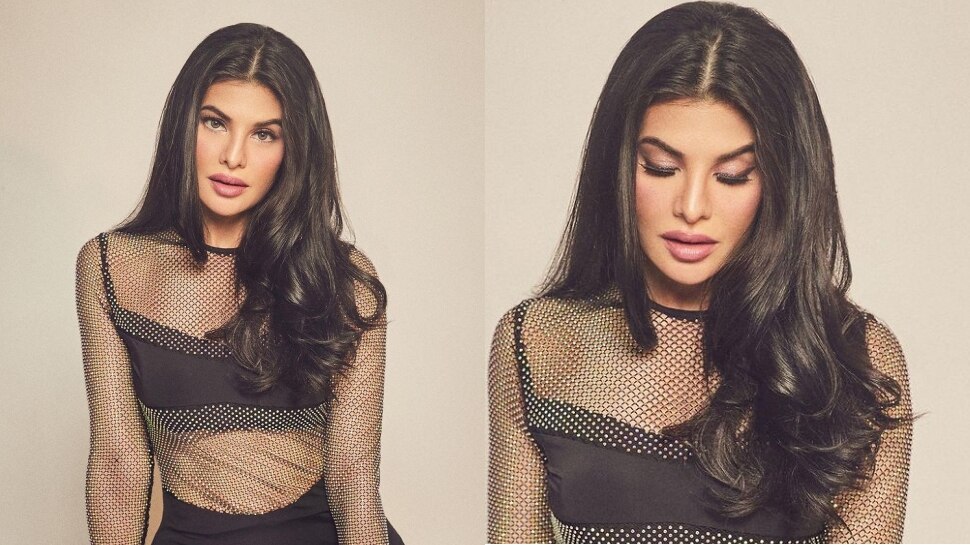 Jacqueline Fernandez supersexy pose in blue short top Jacqueline shows bold look amid sukesh ...