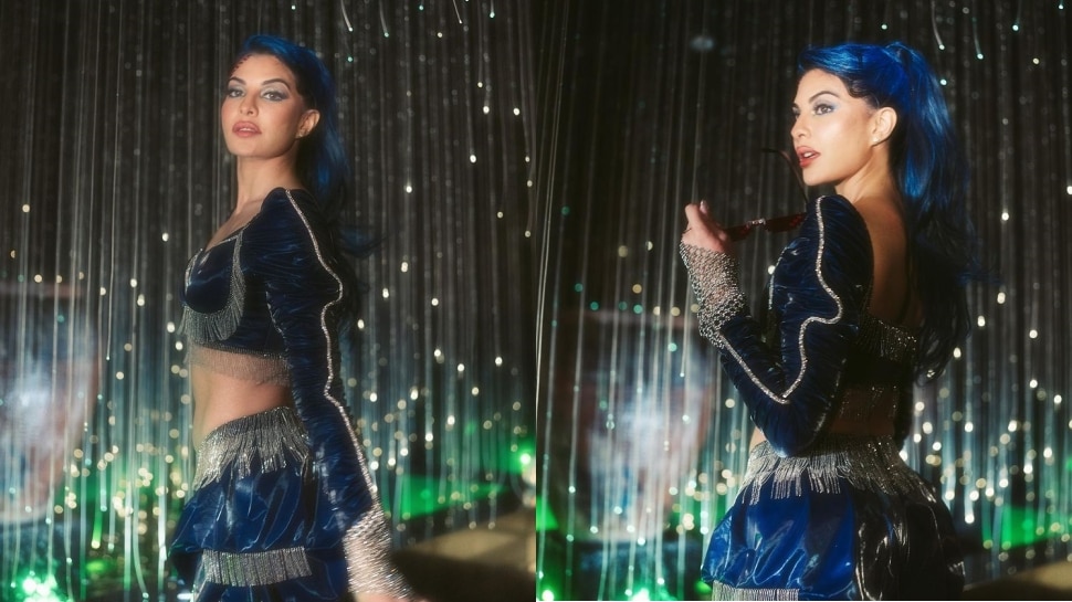 Jacqueline Fernandez supersexy pose in blue short top Jacqueline shows ...