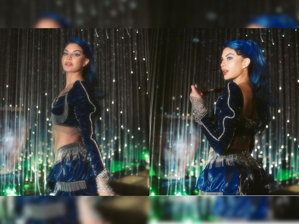 Jacqueline Fernandez supersexy pose in blue short top Jacqueline shows ...