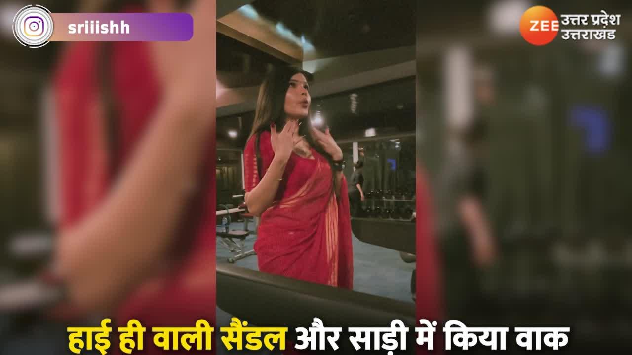 hot model srish shukla red saree viral video walling on treadmill in high heels video trending ...
