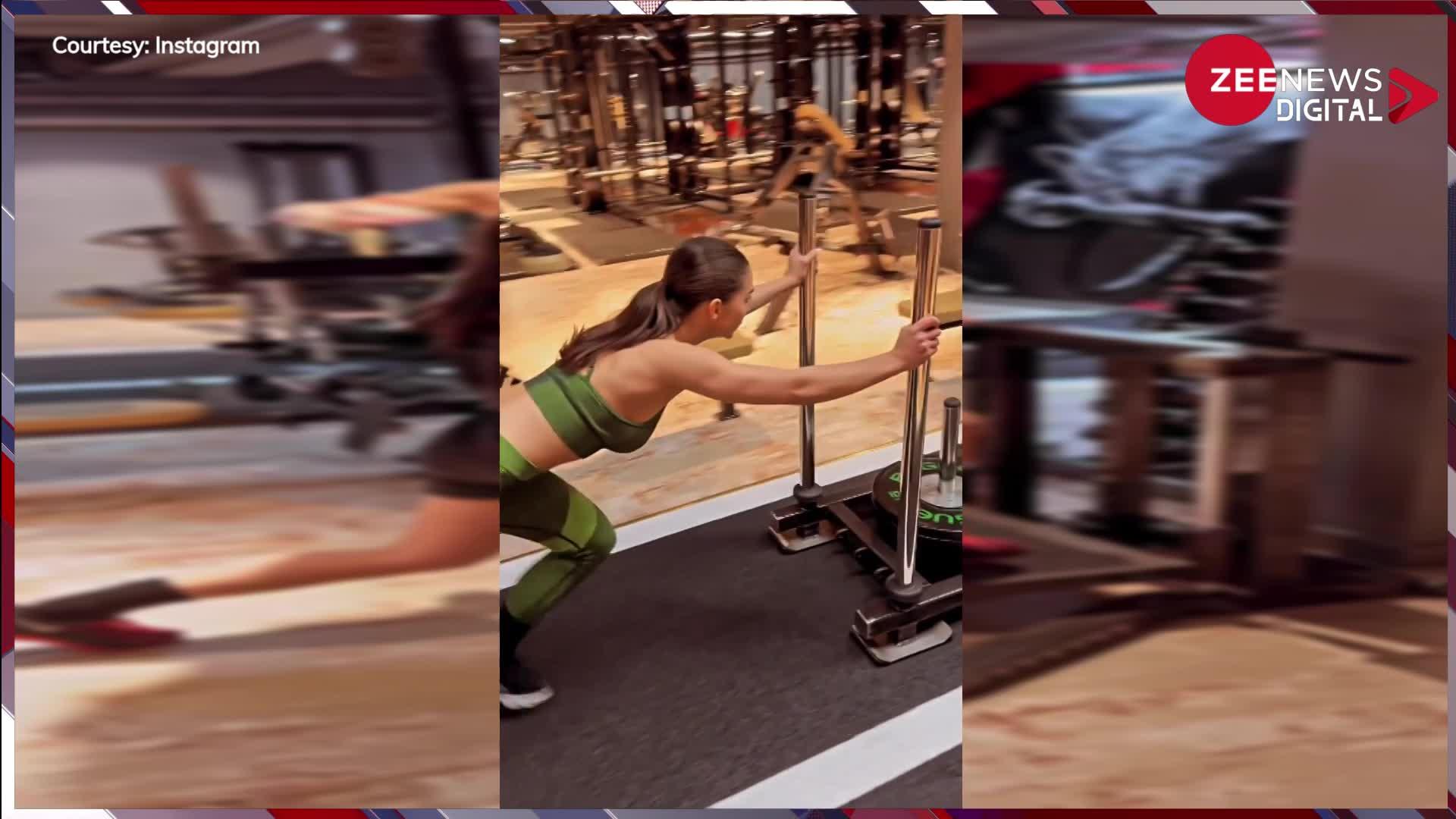 actress Amy Jackson looks too hot as shows her gym workout session ...