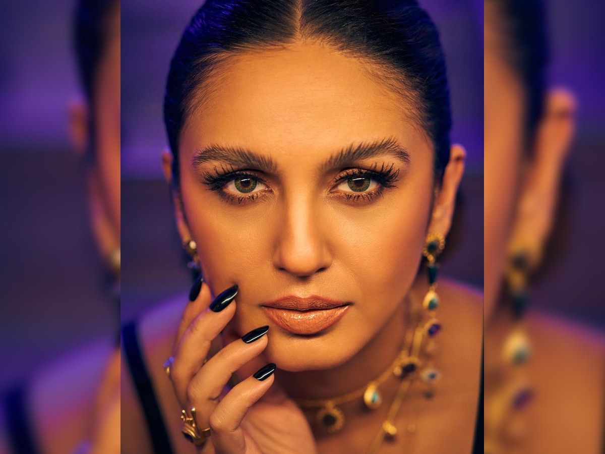 huma qureshi looking sizzling in black color thigh high slit dress see photos