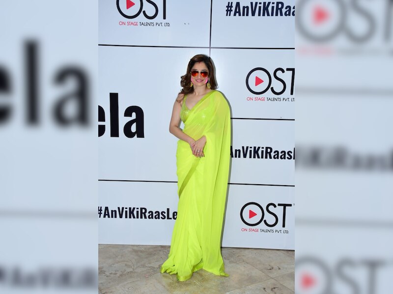 Ankita Lokhande Vicky Jain twining in neon color at holi bash party ...