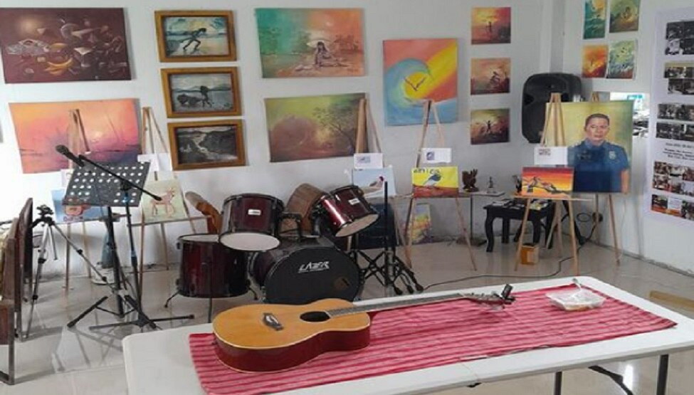 painter using his own blood and hair name elito circa in philippine ...