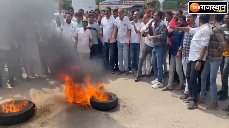 make Bhinmal District People demonstrated by burning tires outside SDM ...