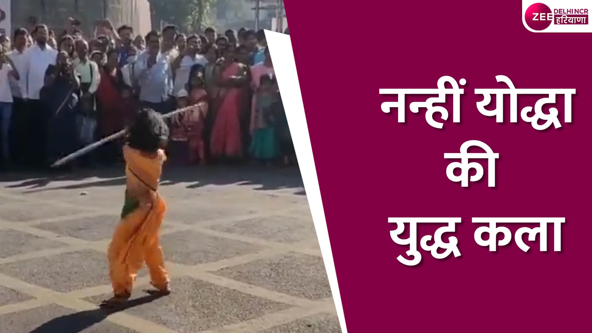 small warrior girl demonstrating lathi fighting skills in public video ...