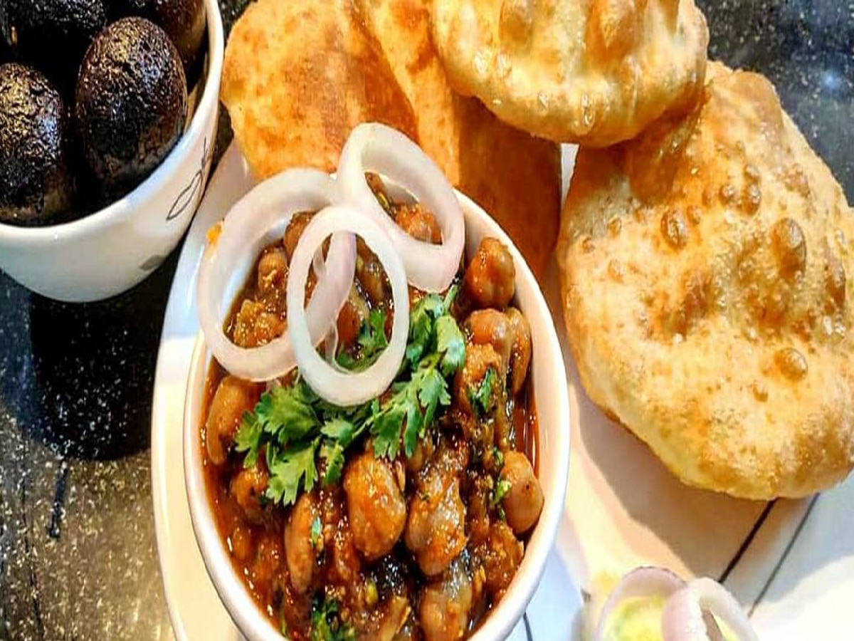famous street food of Delhi Paratha chole bhature Kebabs Rolls Kulfi ...