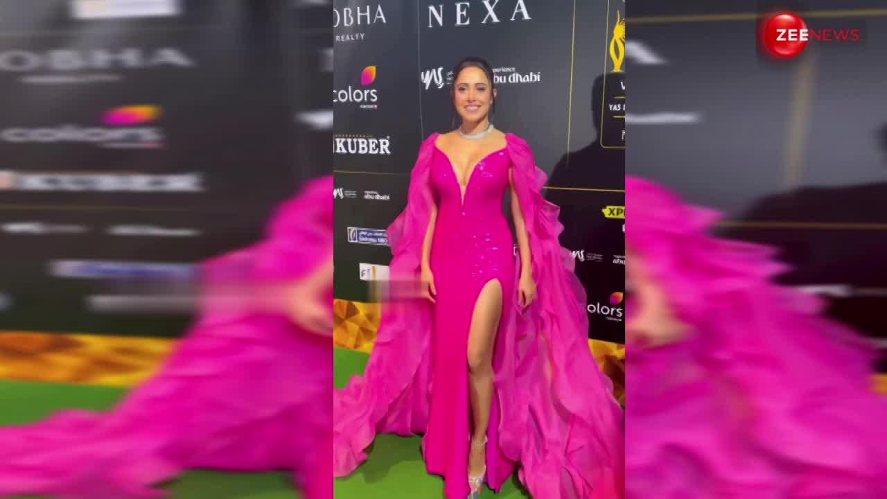 nushrat bharucha sardine hung on hands poses in deep neck pink dress at ...
