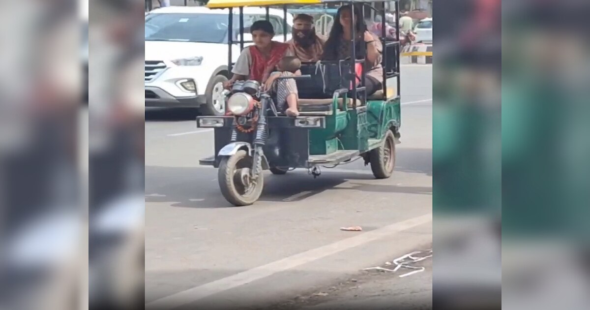 Watch: Mother driving an e-rickshaw with a child in her lap, people ...