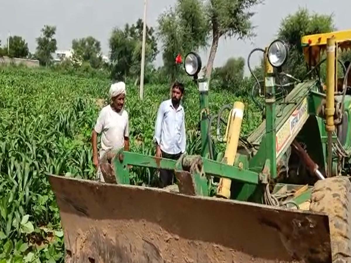 Churu News Bulldozer running on standing crop in field | Churu News ...