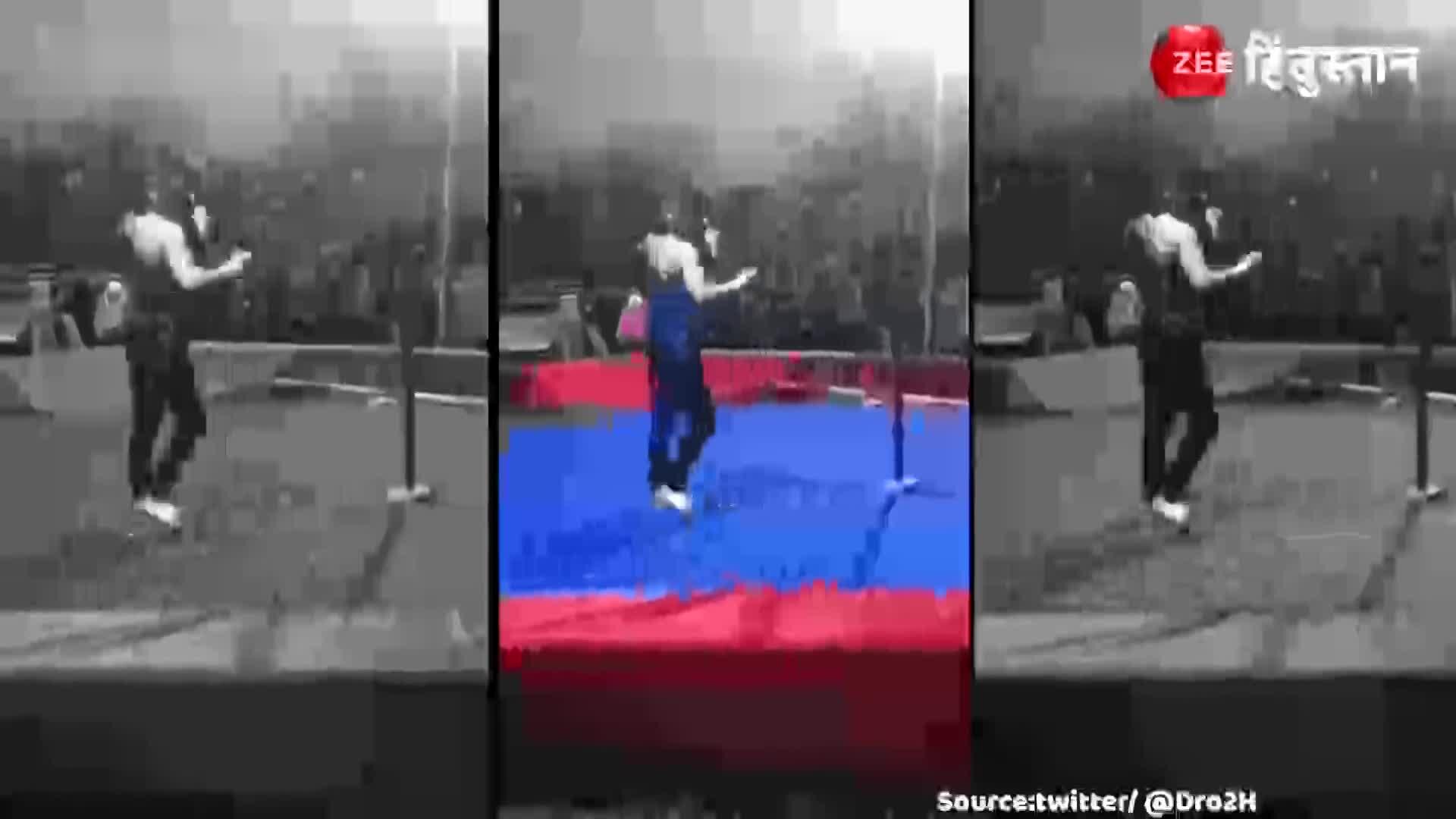 A man walking around with a python wrapped around his neck video goes ...