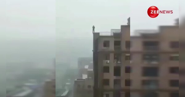 man fell from high building while talking on phone video viral on ...