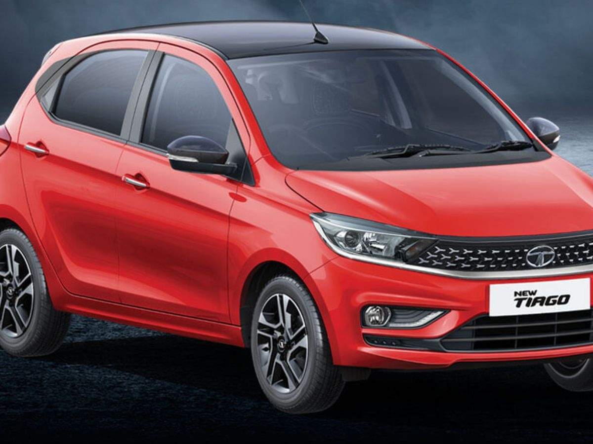 tata tiago twin cylinder on road price cng boot space rivals of maruti ...