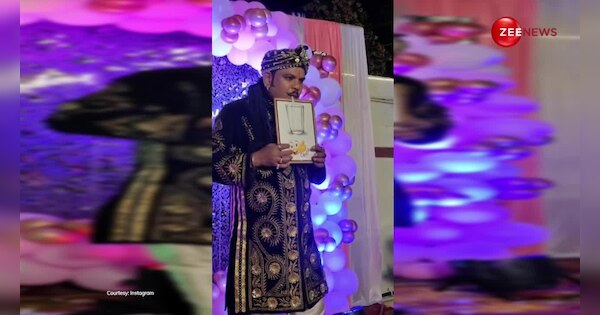 amazing magician drinks juice from a paper printing glass with straw ...