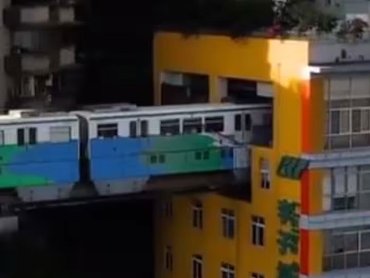 China worlds best train system Train runs through residential building ...