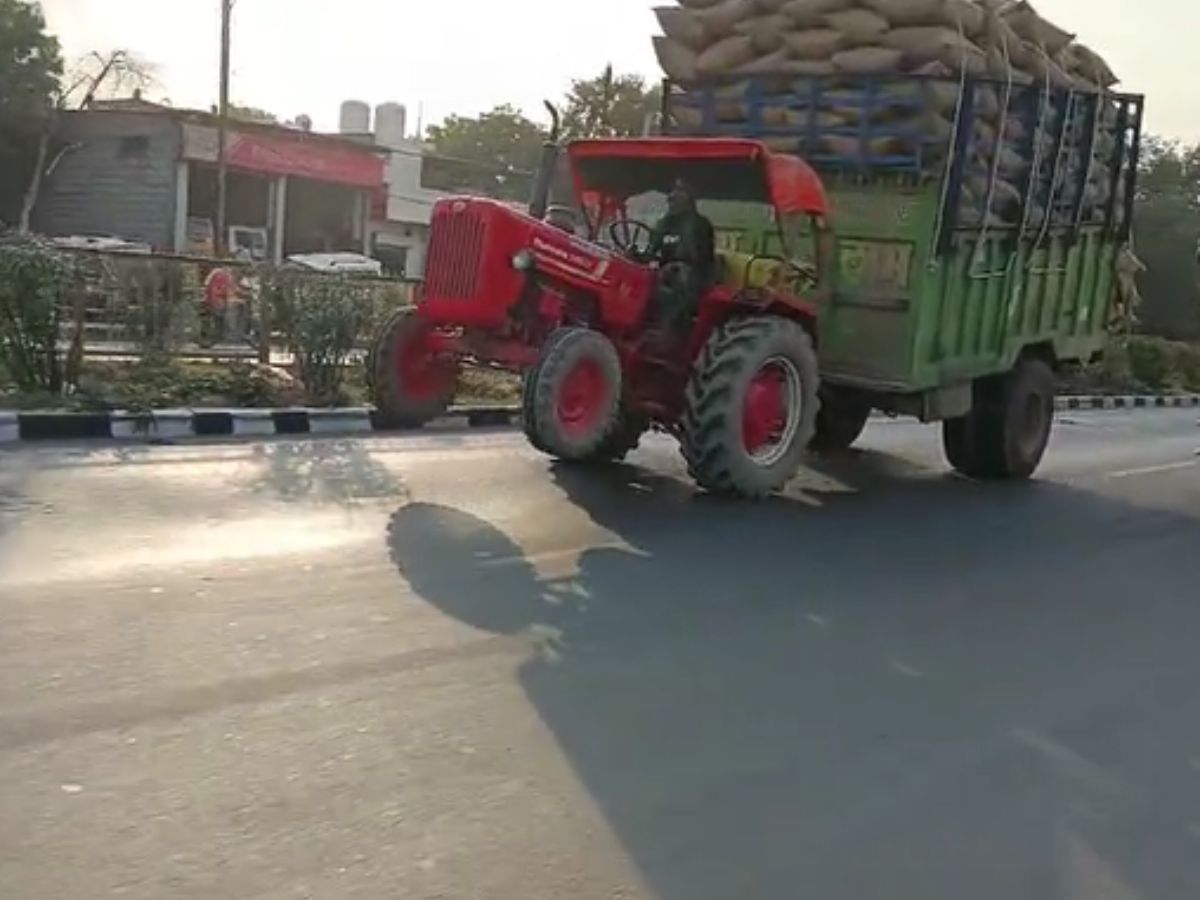 Viral Video Stunt done on road with overloaded tractor ran on two tires ...