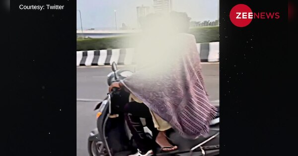 mumbai couple hugging and kissing while riding scooty video went viral | Viral Video: स्कूटी पर ...