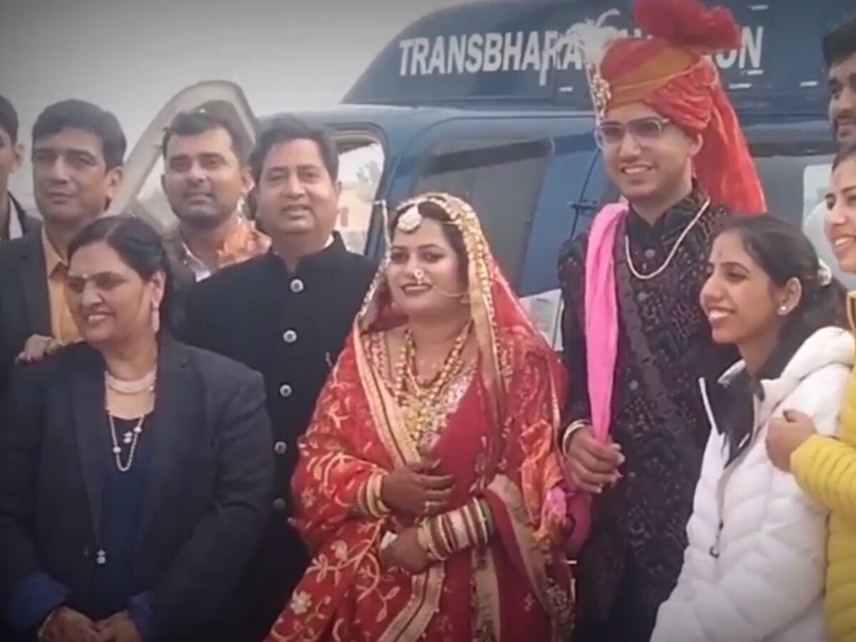 IPS groom took IAS bride by helicopter see pictures of beautiful couple ...