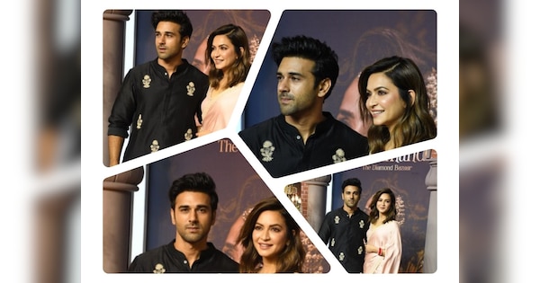 Kriti Kharbanda in red chuda pink saree blushes at Heeramandi Premiere ...